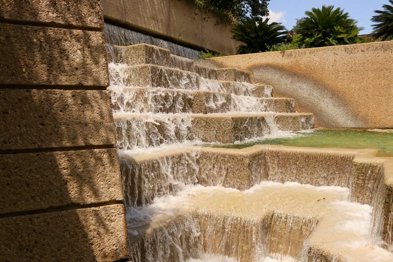Urban waterfall feature stock photo. Image of stream - 275031262