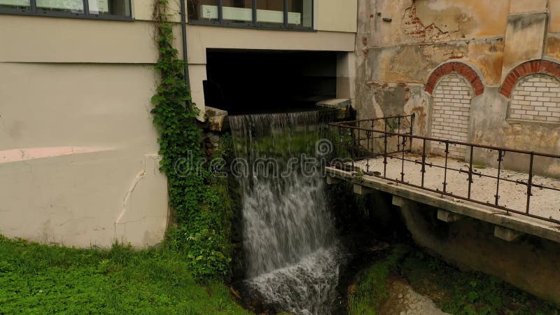 Urban Waterfall by Old Brick Building Stock Video - Video of building ...
