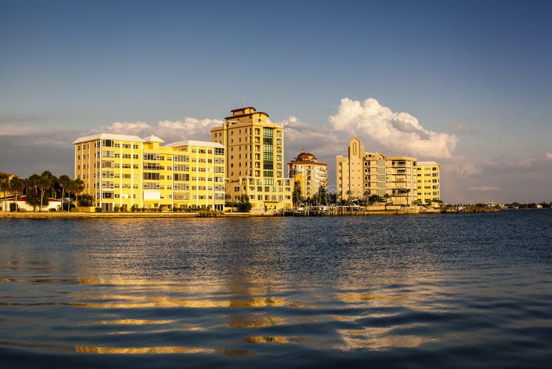 Urban Waterfront Buildings at Sunset Stock Photo - Image of blue, span ...