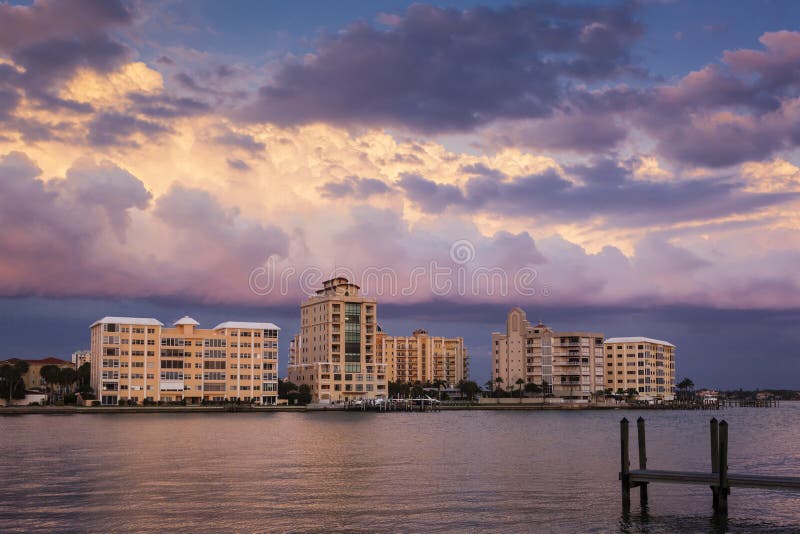 Urban Waterfront Buildings at Sunset Stock Photo - Image of blue, span ...