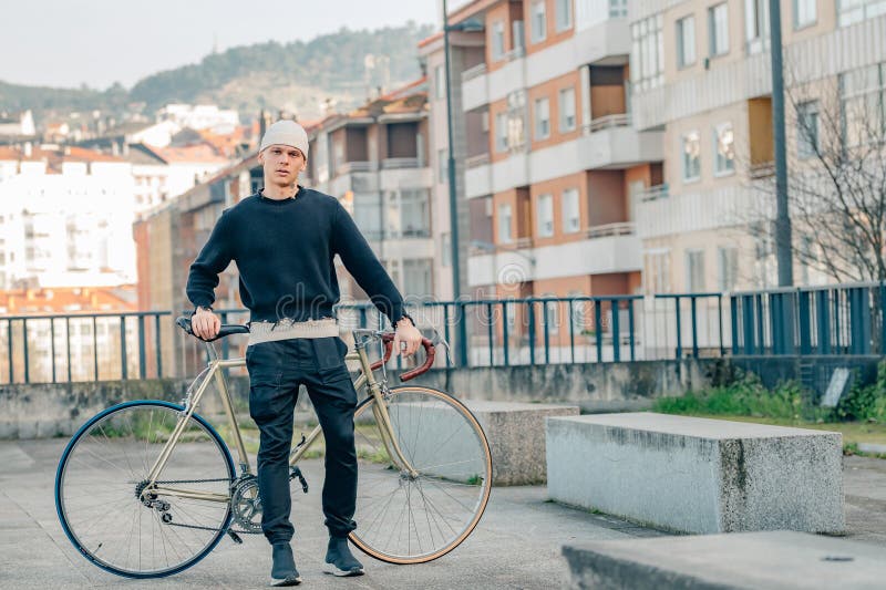 Young Man with Bicycle on the Street Stock Photo - Image of bicycling ...