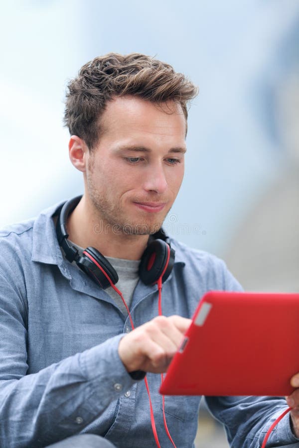 Urban Young Professional Man on Tablet Stock Image - Image of district ...