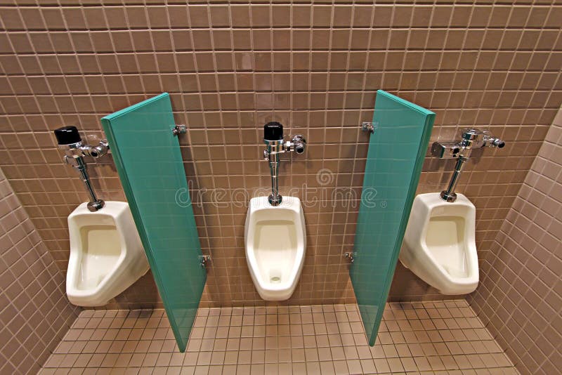 Male Urinals with Poster of Ladies Looking Editorial Stock Image ...