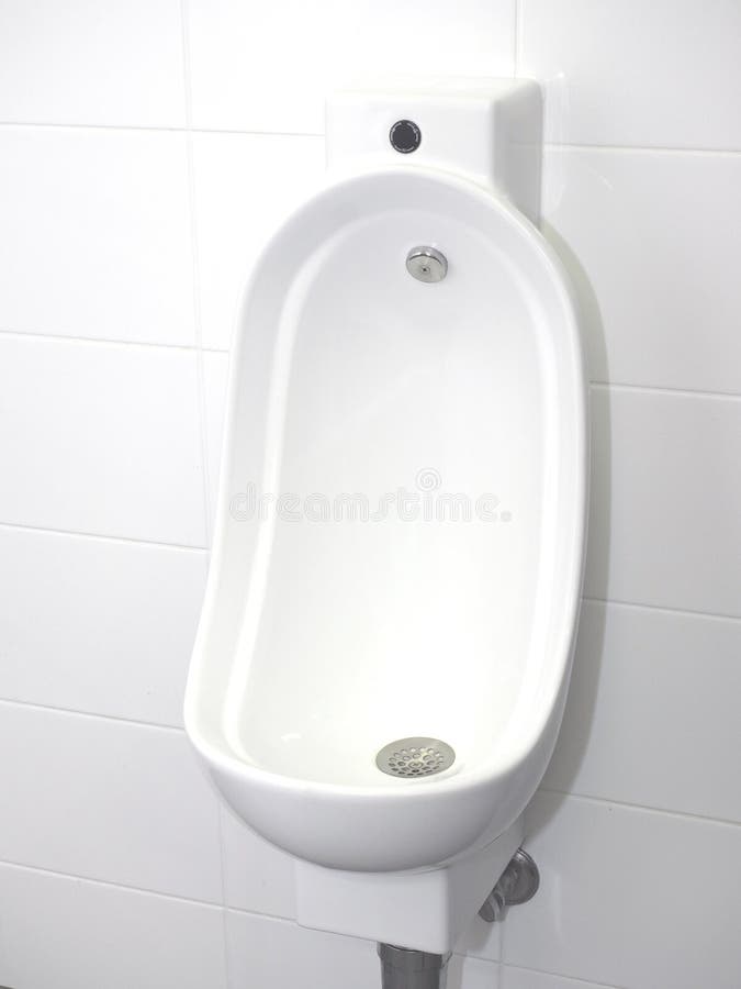 Urinal Bowl with Automatic Hands Free Flush in a Pristine Lavatory ...