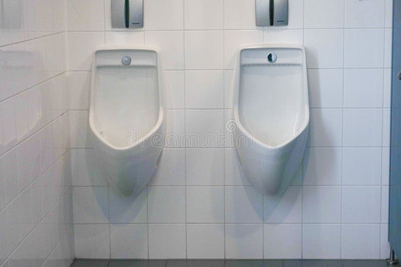 Urinal in a men toilet stock photo. Image of restroom - 279677150