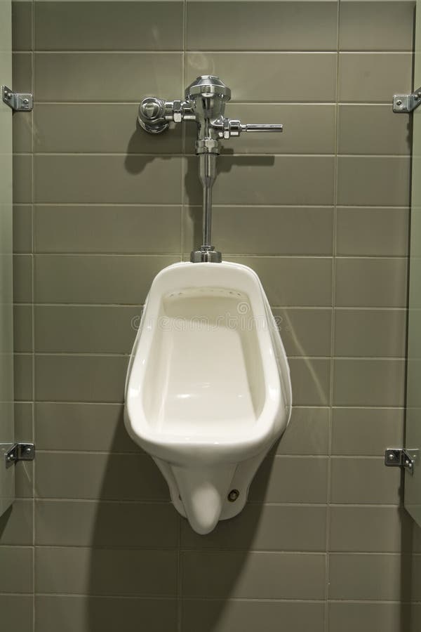 Urinal mounted on wall stock photo. Image of toilet, clean - 5629772