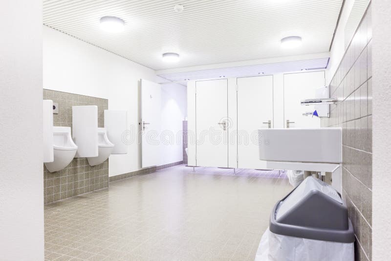 Urinal and sink stock image. Image of shot, urinals - 135269909