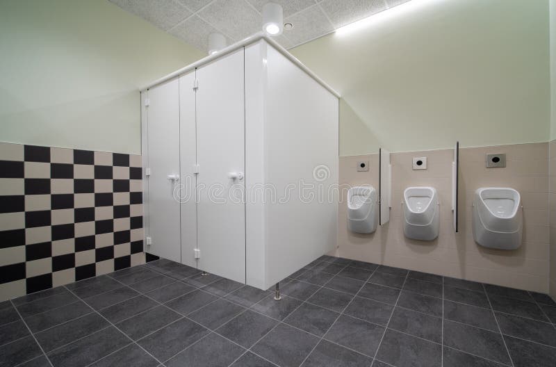 Urinal and toilet doors stock photo. Image of comfortable - 231253478