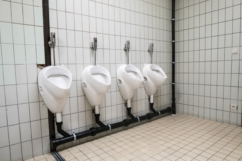 Urinal on the wall stock photo. Image of plumbing, flush - 163698668