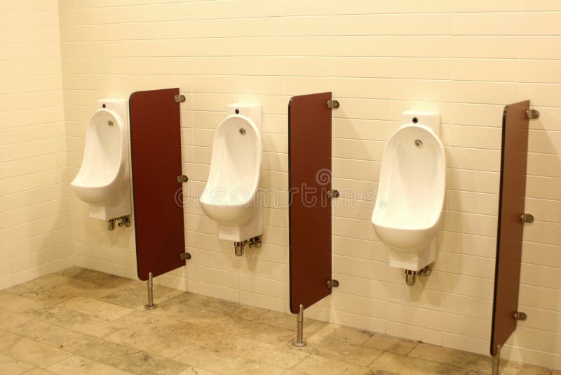 Male Urinals with Poster of Ladies Looking Editorial Stock Image ...