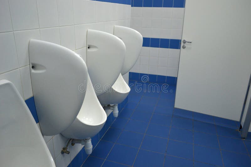 Urinals in the men`s room stock photo. Image of capacity - 91108074