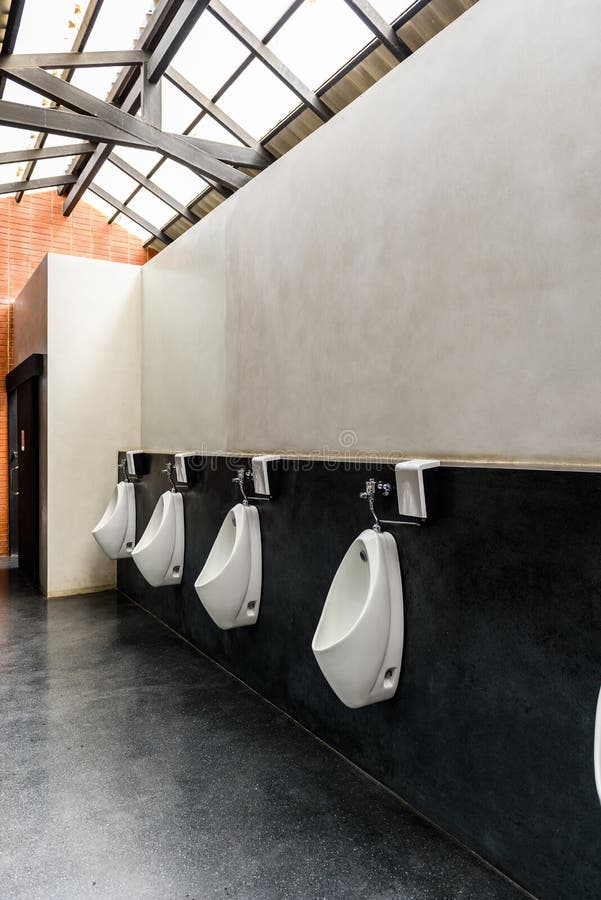 Urinals in public toilet stock photo. Image of latrine - 90913390