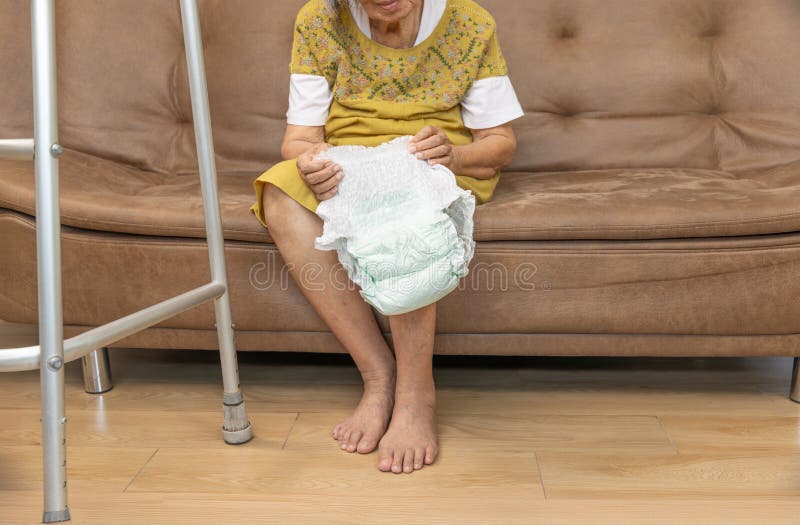 Urinary Incontinence in Elderly and Changing Diaper Stock Image - Image ...