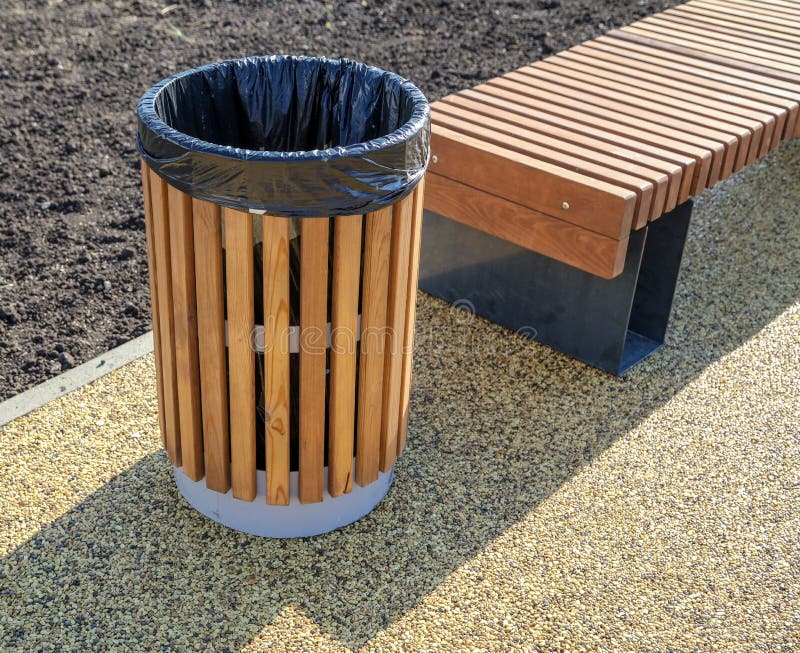 Urn near the park bench stock photo. Image of bench - 139538034