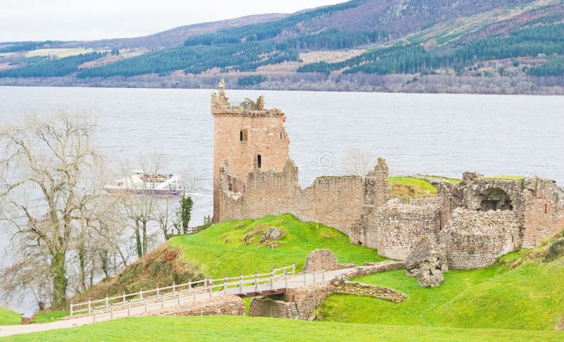 Urquart Castle and boat. stock image. Image of boat, sailing - 23853931