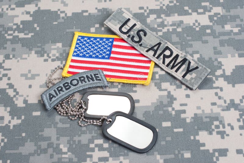 US ARMY Airborne Tab with Blank Dog Tags on Camouflage Uniform Stock ...