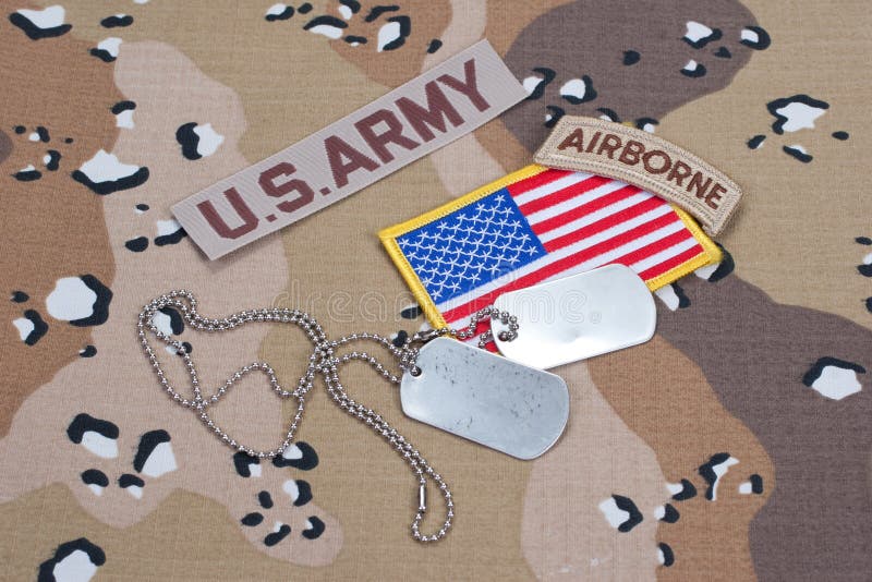 US ARMY Airborne Tab with Blank Dog Tags on Camouflage Uniform Stock ...