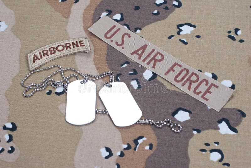 US ARMY Airborne Tab with Blank Dog Tags on Camouflage Uniform Stock ...
