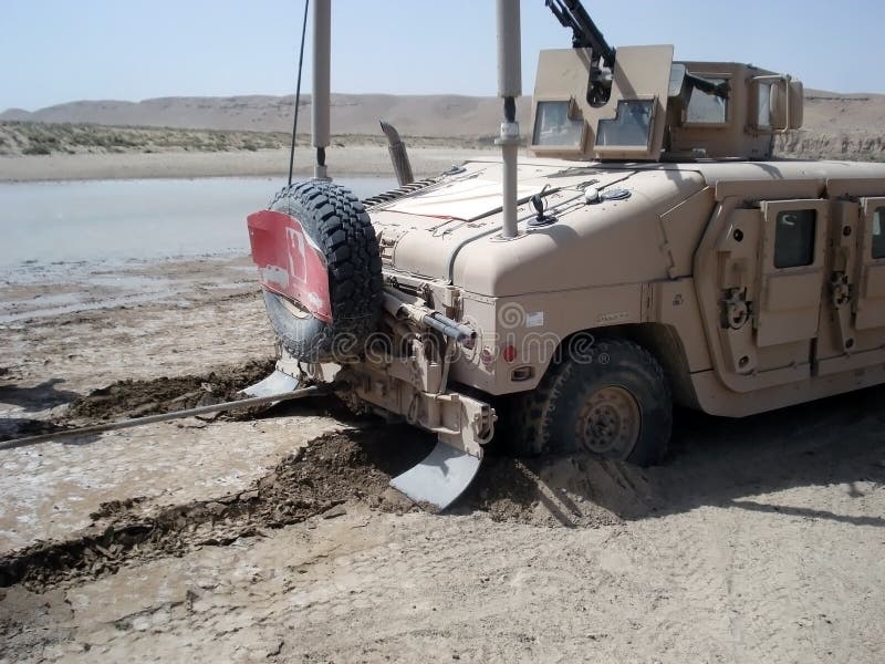 US Army Humvee Stuck in Sand Stock Photo - Image of american, armed ...