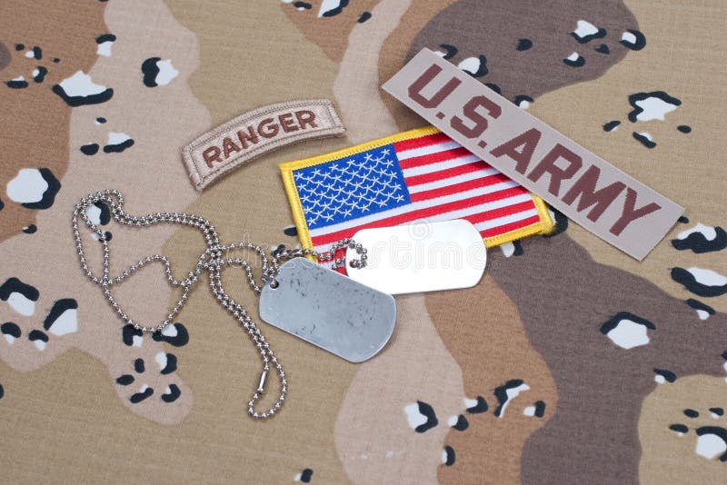 US ARMY Ranger Tab with Blank Dog Tags on Camouflage Uniform Editorial ...