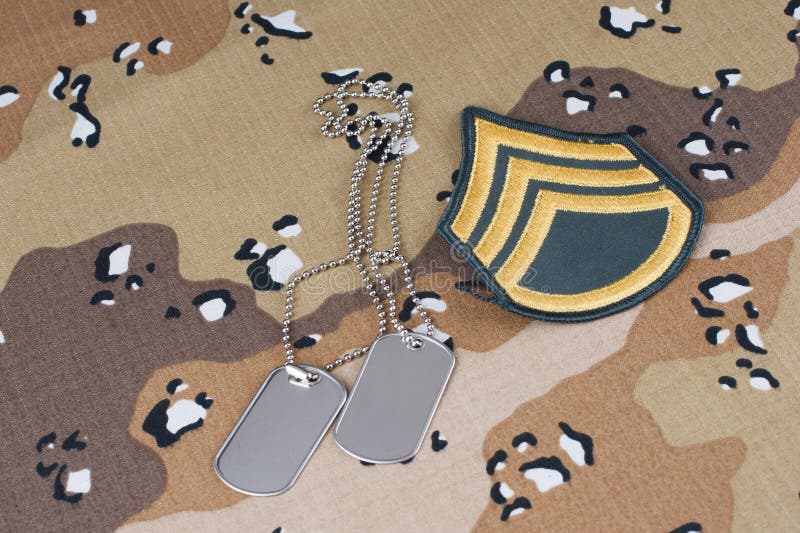 US ARMY Sergeant Rank Patch and Dog Tags on Desert Camouflage Uniform ...