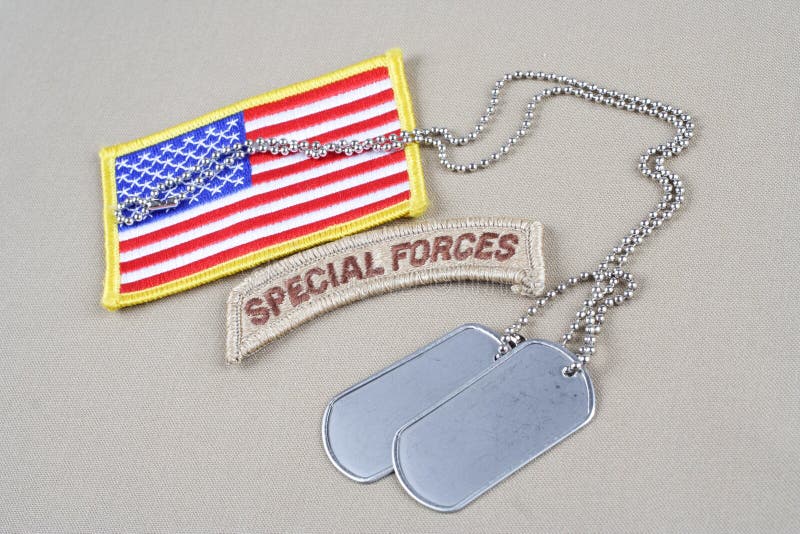 US ARMY Special Forces Tab with Blank Dog Tags on Camouflage Uniform ...