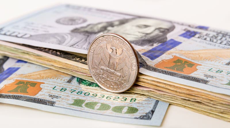 US Currency with One Quarter Coin Stock Photo - Image of capitol ...