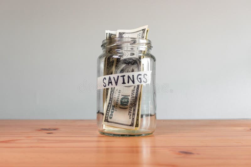 US Dollar Bills in a Glass Jar Labeled "savings Stock Image - Image of ...