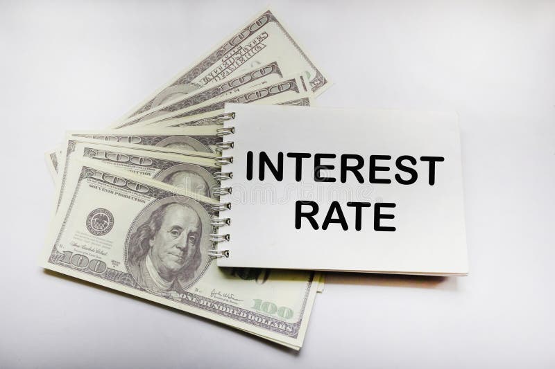 US Dollars on White Background with Text on Notepad SHOWING INCREASING ...