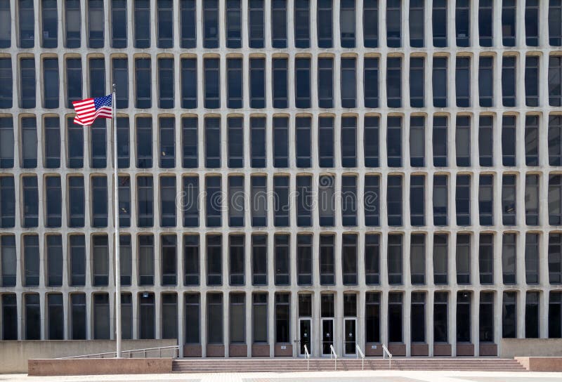 US Flag in Front of a Building Stock Photo - Image of business, modern ...
