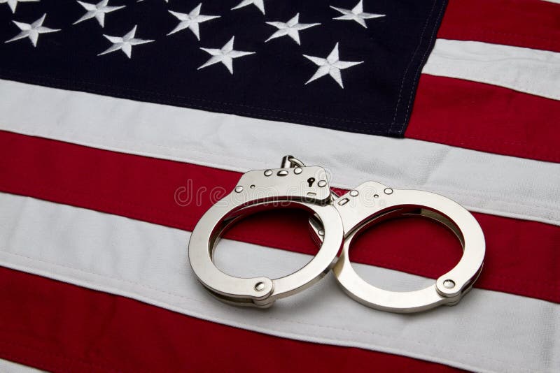 US Flag and Handcuffs stock image. Image of crime, united - 23050893