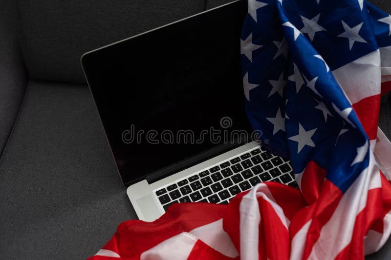 US Flag and Laptop on Background with Copy Space. Stock Image - Image ...