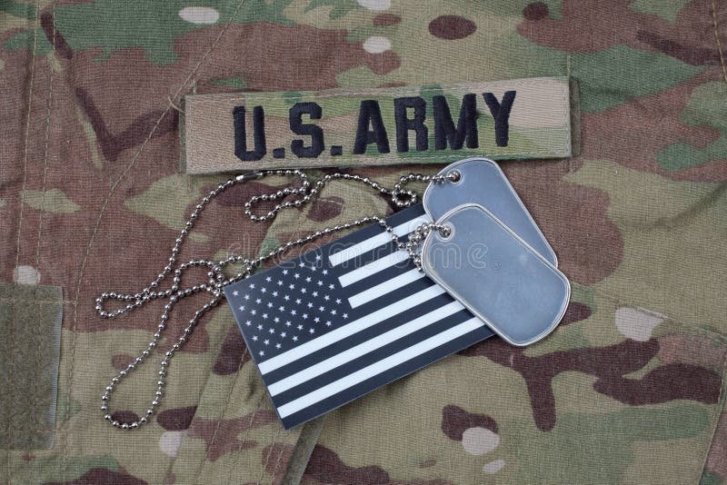 US Flag Patch with Dog Tag on US ARMY Camouflage Uniform Stock Photo ...