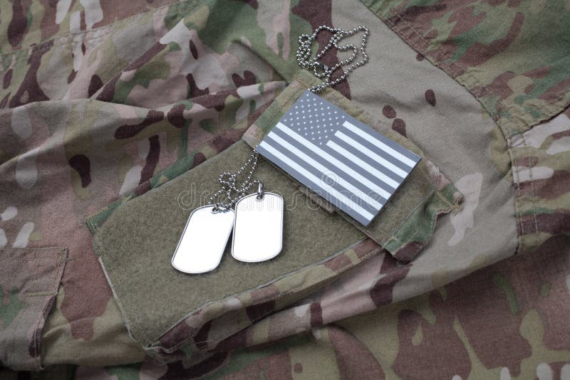 US Flag Patch with Dog Tag on US ARMY Camouflage Uniform Stock Image ...