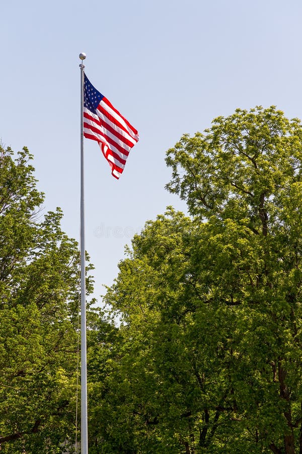 US Flag on Tall Flag Pole stock photo. Image of independence - 24798428