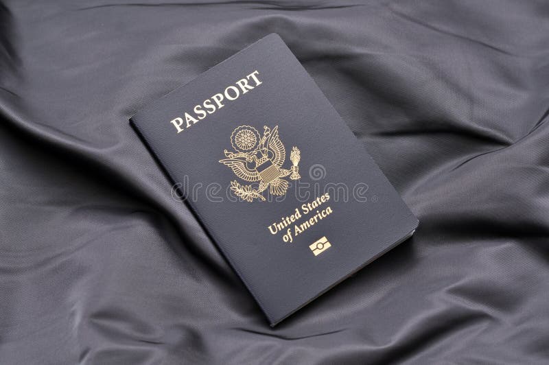 US Passports on a Dark Blue Fabric Background. US Document Stock Photo ...