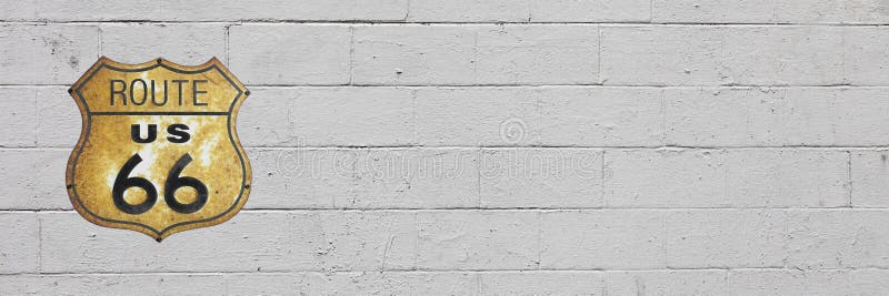 US ROUTE 66 Sign on a Wall with Copy Space Stock Image - Image of white, culture: 269568987