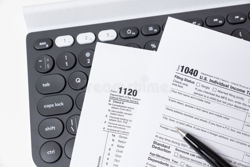 US Tax Form on Computer Keyboard Editorial Stock Photo - Image of ...