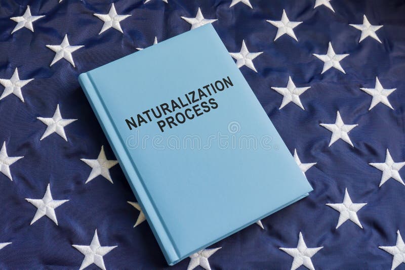 USA Flag and a Book about the Naturalization Process. Stock Photo ...