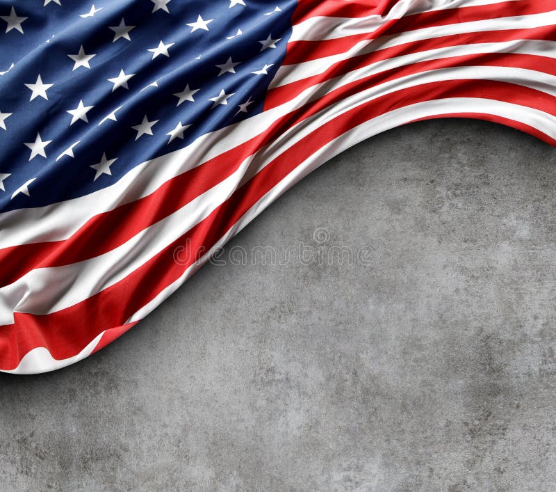 The Flag of the US on Grey Wooden Desk and Copy Space. Stock Photo ...