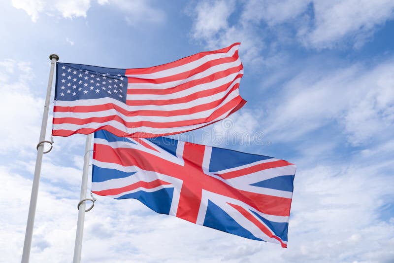 USA and UK Flags Flutter in the Wind. Stock Photo - Image of british ...