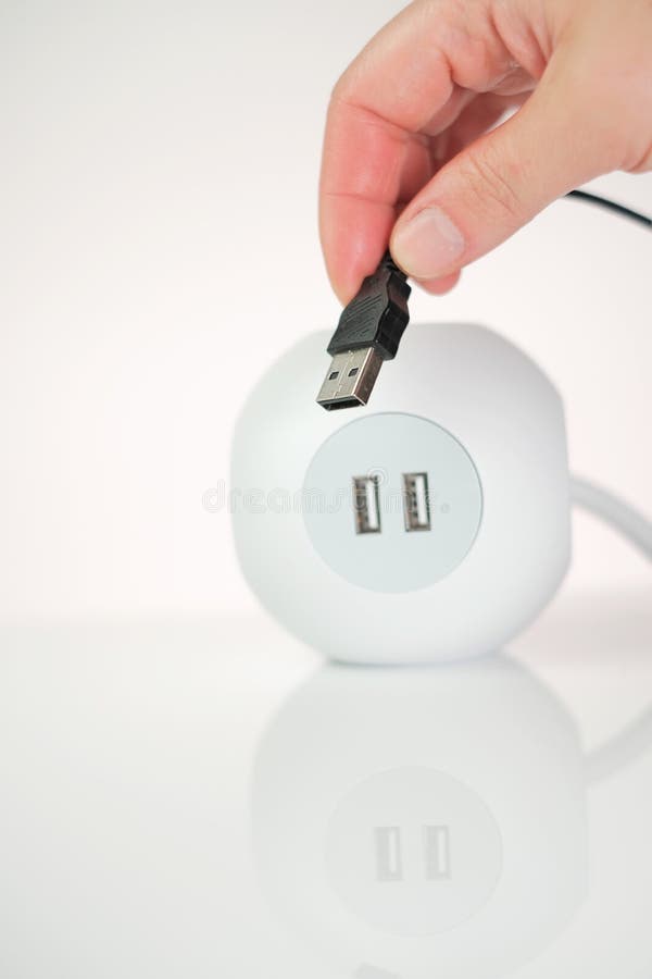 USB Adapter.Socket with USB Connector.Hands and USB Cable in the ...
