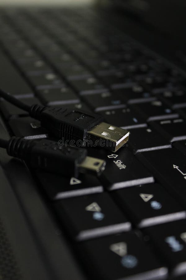 The Usb Cable Above the Black Laptop Keyboard Stock Image - Image of ...