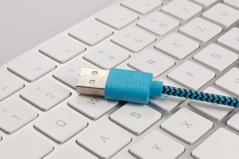 A USB Cable on a Computer Keyboard Stock Photo - Image of computer ...