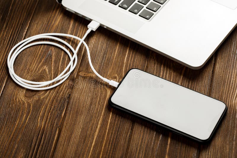 A USB Cable Connects Your Phone and Laptop Stock Image - Image of ...