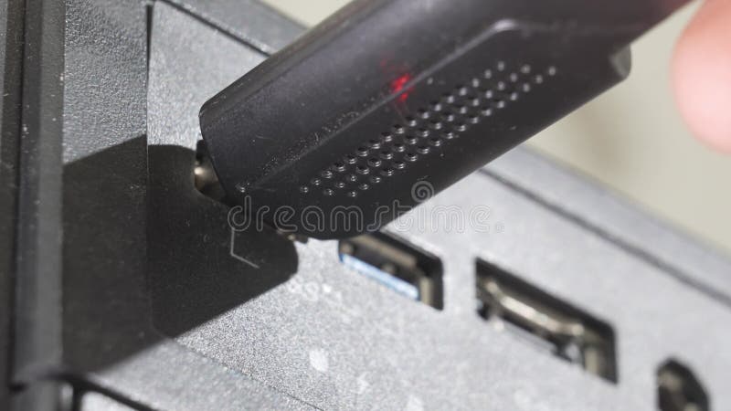 The USB Cable is Inserted into the Connector of the Device. Stock ...