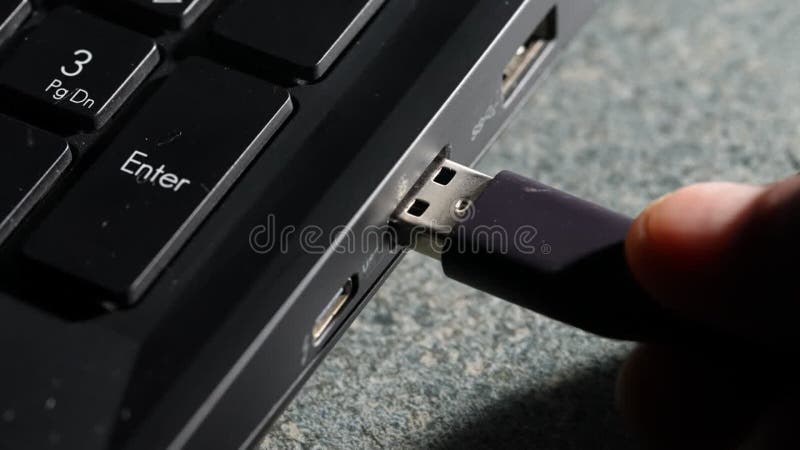 USB Cable Inserted and Removed from an Old Laptop. Close-up Stock ...