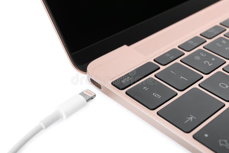 USB Cable with Lightning Connector and Laptop on White Background Stock ...