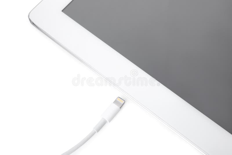 USB Cable with Lightning Connector and Tablet on White Background Stock ...