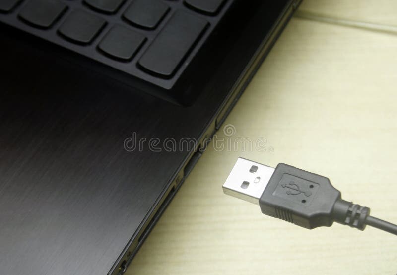 Plugging In The USB Cable stock photo. Image of device - 22805118